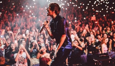 Louis Tomlinson returns to world tour stage after brief break