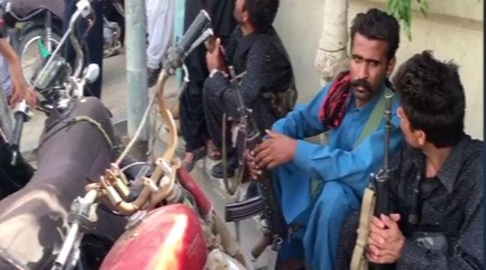 Gunmen seen in PTI Karachi rally despite ban on weapons' display