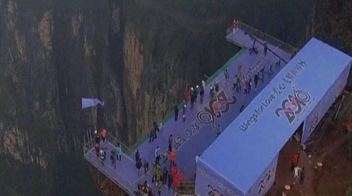 Watch this video of people flying