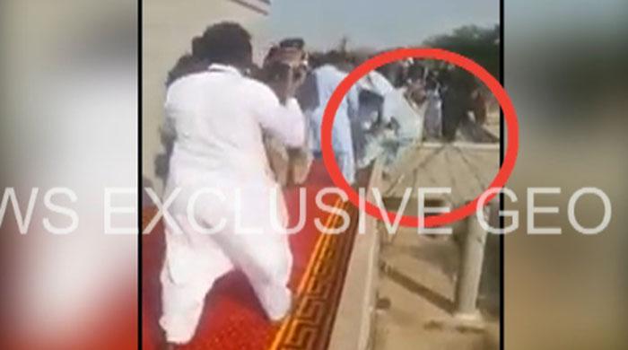 VIDEO: Man falls off stage during PTI rally