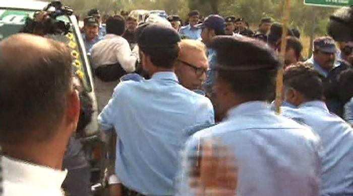 PTI leaders Imran Ismail, Arif Alvi detained and later released by police