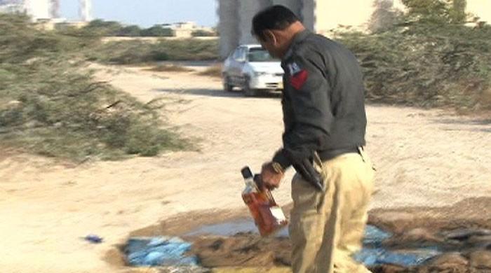 Customs, police personnel race to pick bottles after ceremony to ...