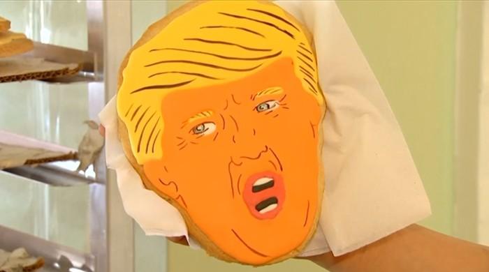 Pastry chef paints cookies in Trump's likeness