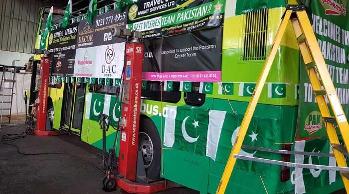 Fans in Birmingham decorate double-decker bus to support Team Pakistan