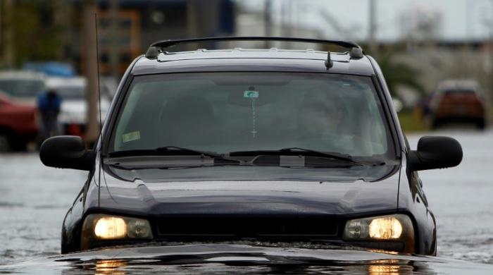 Puerto Rico rushes to evacuate thousands amid fears dam will burst