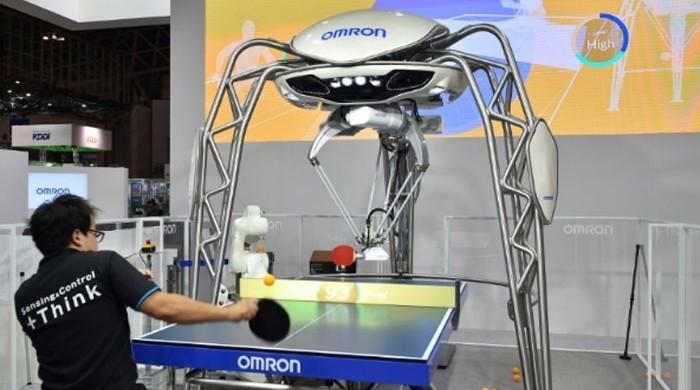 Smash hit: Ping pong robot takes on Olympian at Tokyo tech fair