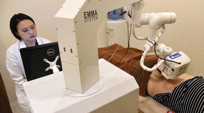 Emma the robot masseuse gets to work in Singapore