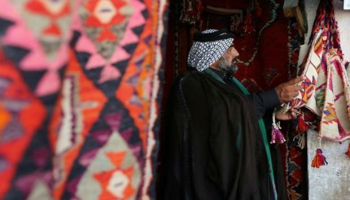 Traditional carpet weaving in central Iraq unravels