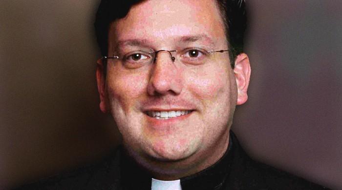US priest, under investigation, leaps to death from high-rise