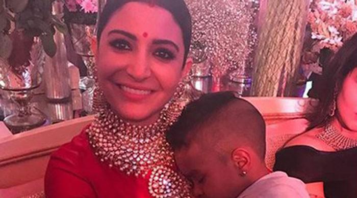 Shikhar Dhawan’s baby sleeping on Anushka's lap is winning hearts