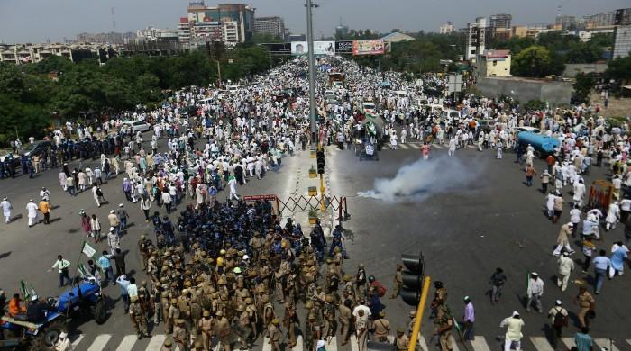 Indian police fire tear gas, water cannon to break up farmers' protest