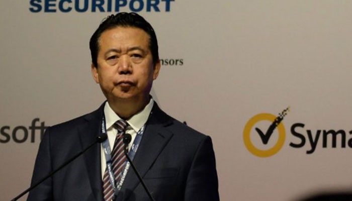 China says Interpol chief being probed 'on suspicion of violating the law'