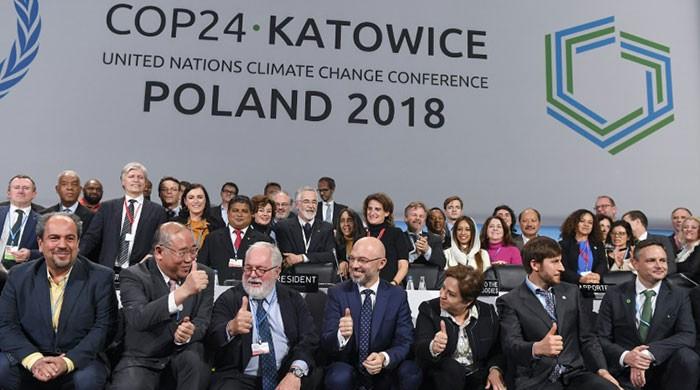 Nations agree milestone rule book for Paris climate treaty