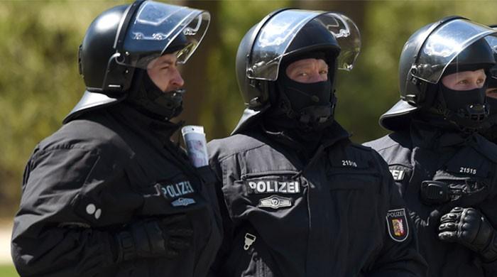 Ten hurt as car plows into bus stop in western Germany: police