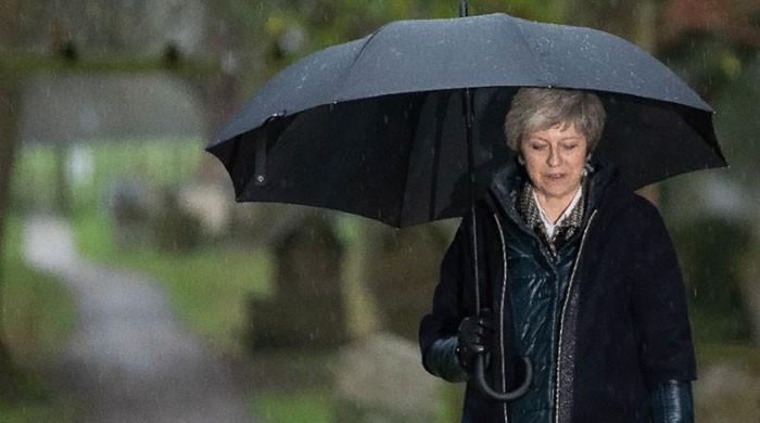 Britain’s ‘zombie PM’ May staggers into battle