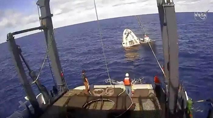 Elon Musk's SpaceX capsule splashes down off Florida coast