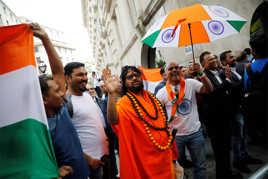 IN PICTURES: Protest in UK against India's brutalities, revocation of ...