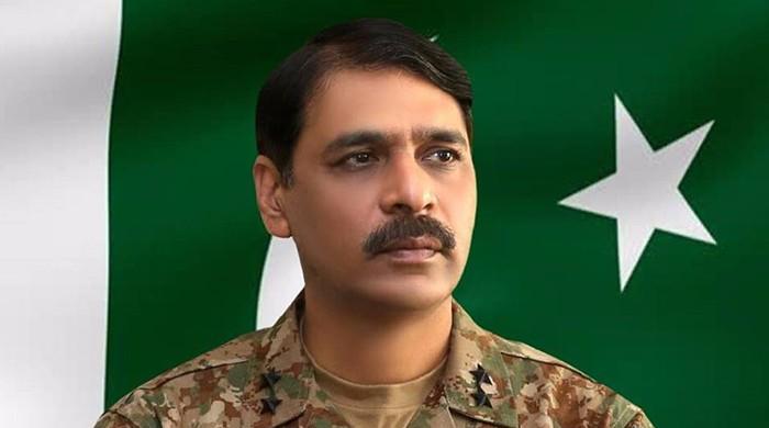 Posters of DG ISPR Maj-Gen Asif Ghafoor surface in Indian occupied Kashmir