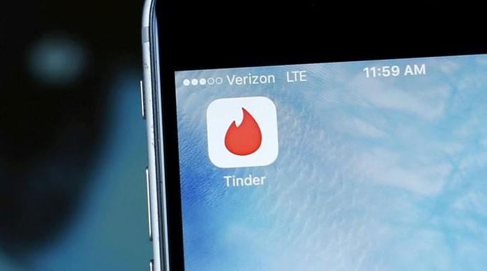 Tinder owner sued for using fake profiles in ads