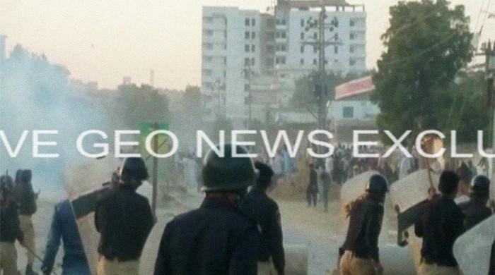 Police fire tear gas as people protest anti-encroachment operation in ...