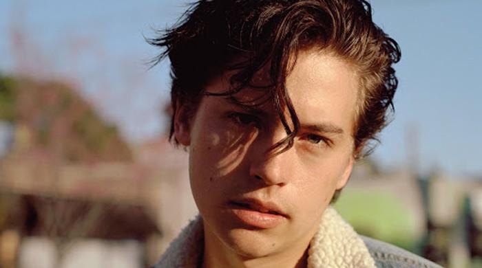 Cole Sprouse feels happy he didn’t miss the high school experience