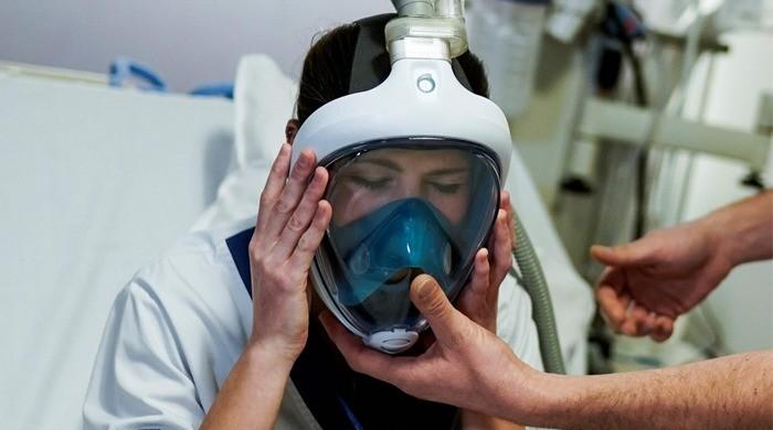 Coronavirus: Snorkel masks being used in European hospitals to ease ...
