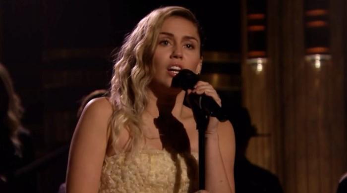 Miley Cyrus takes #ClassOf2020 on a trip down memory lane with 'The Climb'