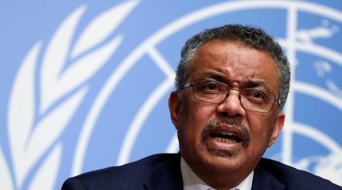 WHO chief faces towering challenge of US-China tensions over COVID-19