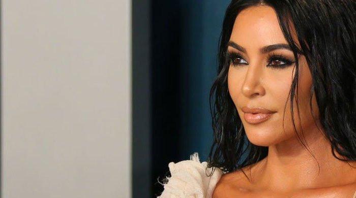 Kim Kardashian all smiles as she parties with friends