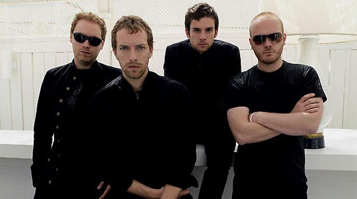 Coldplay kick off opening performance at 2021 Brit Awards