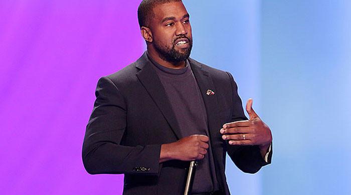 Kanye West dons bizarre face-mask in Los Angeles