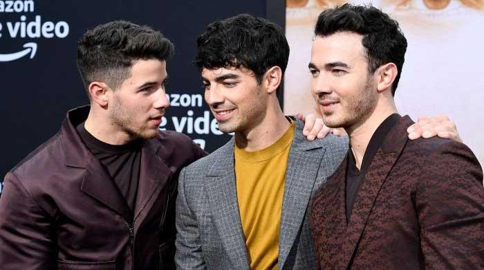 The Jonas Brothers recall being abandoned by angry unpaid bus driver
