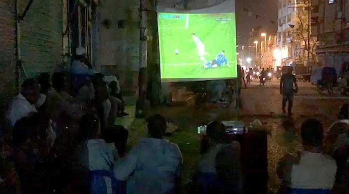 Watch: Avid football fans in Karachi relish Euro Cup final on large screens