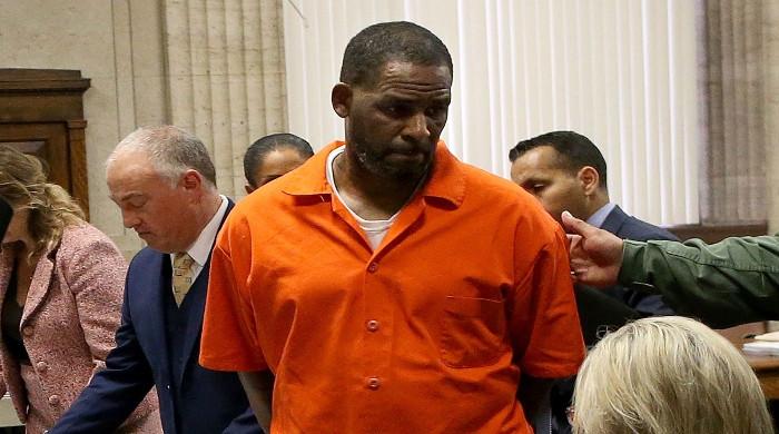 R. Kelly appears in New York court before sex abuse trial begins
