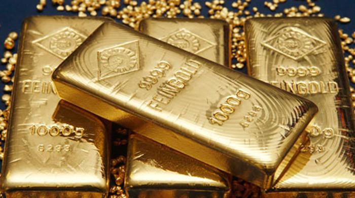 Gold retreats in line with international market