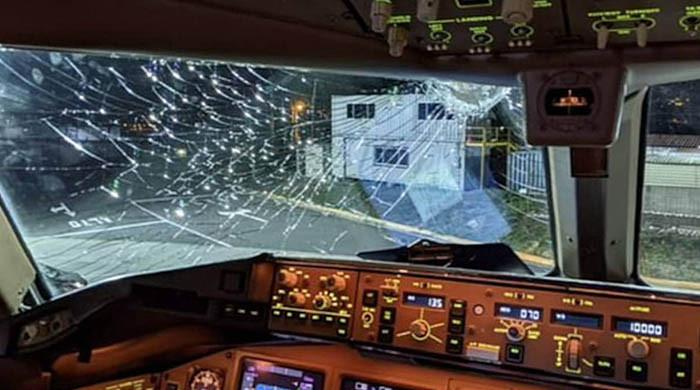 Plane's windscreen shattered by ice block in mid air