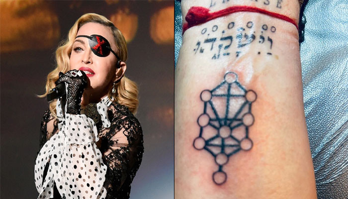 Madonna gets her wrist inked with a Kabbalah symbol