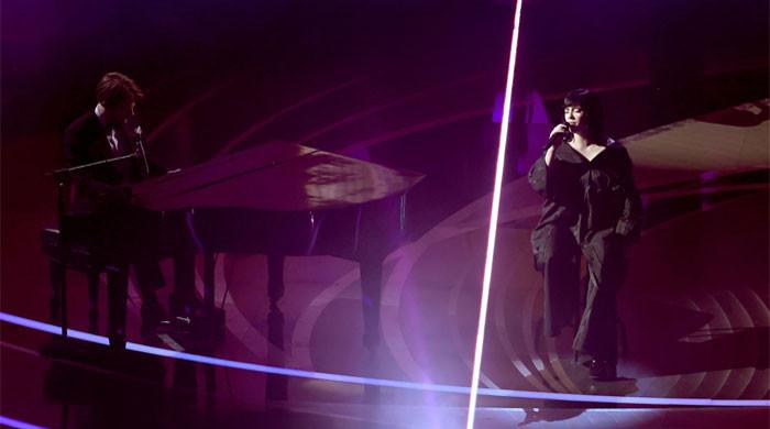 Music takes center stage at Oscars gala