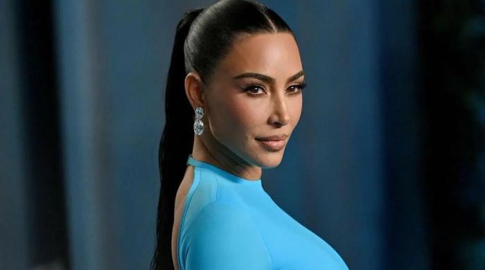 Kim Kardashian’s poolside pics spark ‘photoshop’ claims online
