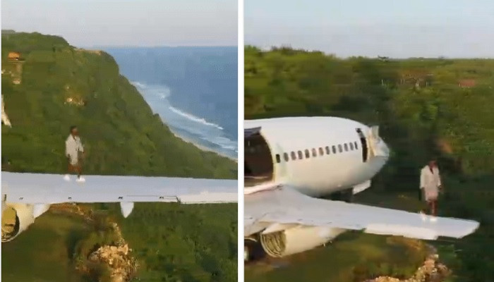 Watch: Man walks on wing of abandoned plane