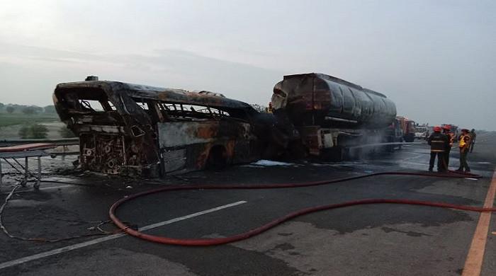 Bus-oil tanker collision leaves 20 dead on M-5 Motorway