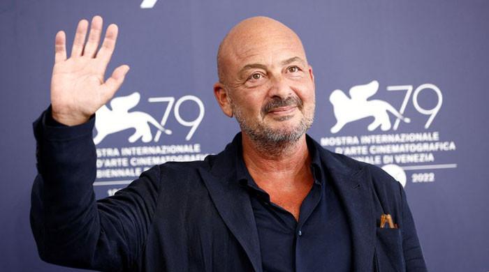 Famed male Italian director tells Venice he was born a woman