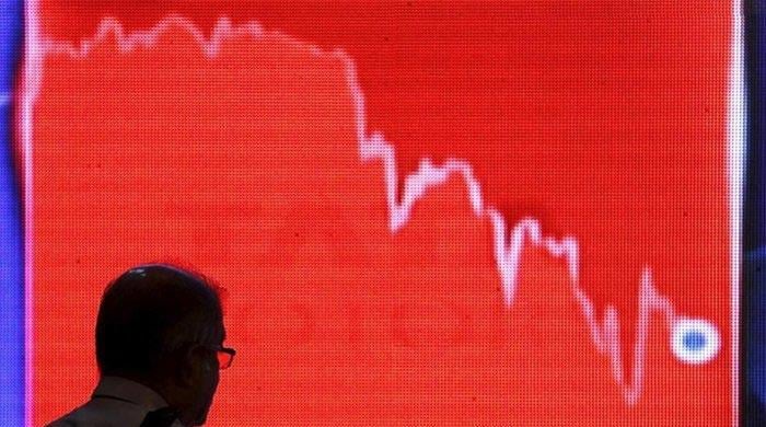 Stocks flat on mix of positive, negative news