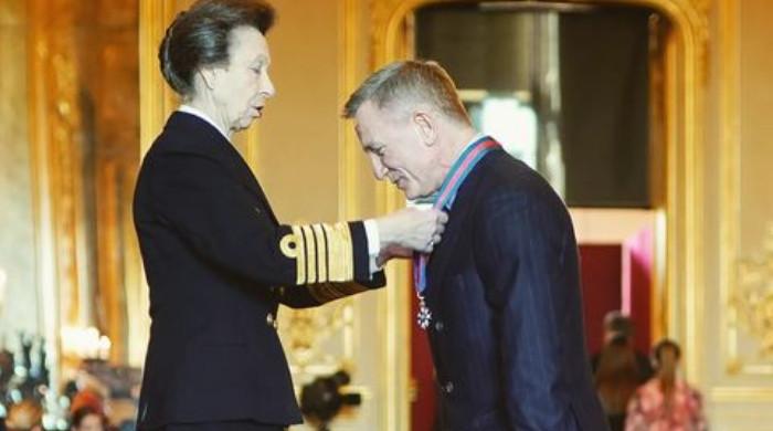 Princess Anne awards Daniel Craig with royal honour given to James Bond