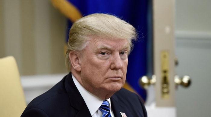 US Justice Dept taps independent prosecutor for Trump probes