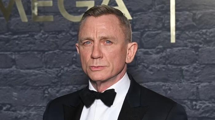 Daniel Craig channels 007 style at James Bond 60th anniversary party