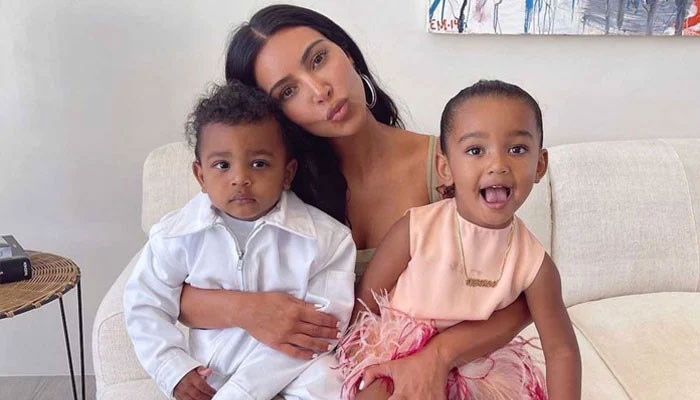 Kim Kardashian snuggles with her kids in adorable social media selfie