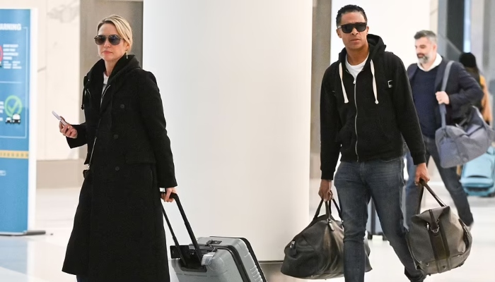 T.J. Holmes and Amy Robach snapped at the airport following romantic ...