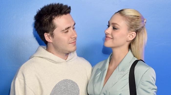 Nicola Peltz, Brooklyn Beckham drop glimpse of their impromptu rain ...