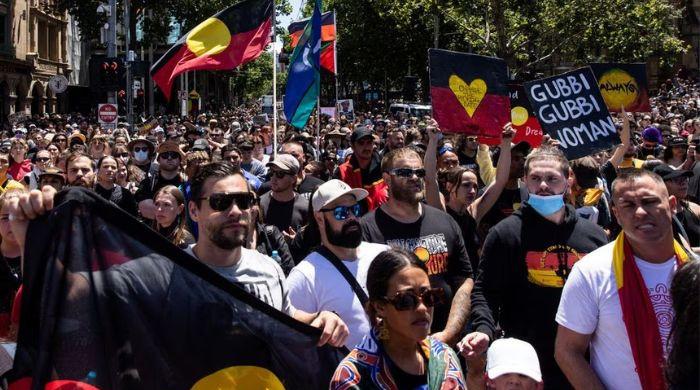 Thousands rally for 'Invasion Day' protests on Australia Day holiday